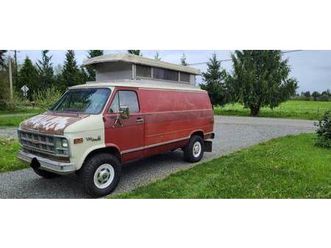 GMC VANDURA 79-gmc-4x4-van-with-pop-top-roof occasion - Le Parking