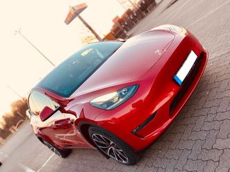 TESLA MODEL Y tesla-model-y-long-range-red-multicoat-premium ...